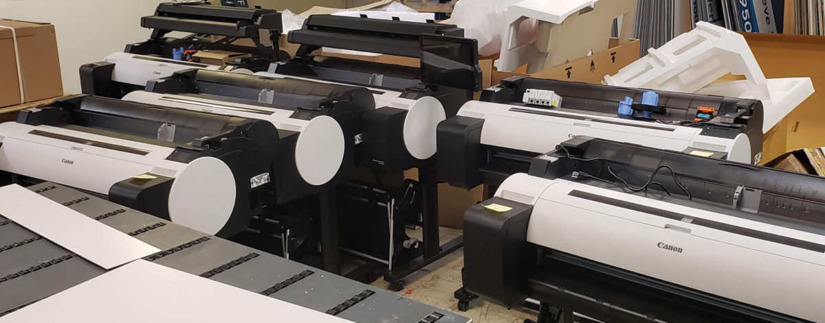A Busy Day Unboxing Canons - Milwaukee Sign Printing, Custom Banners ...